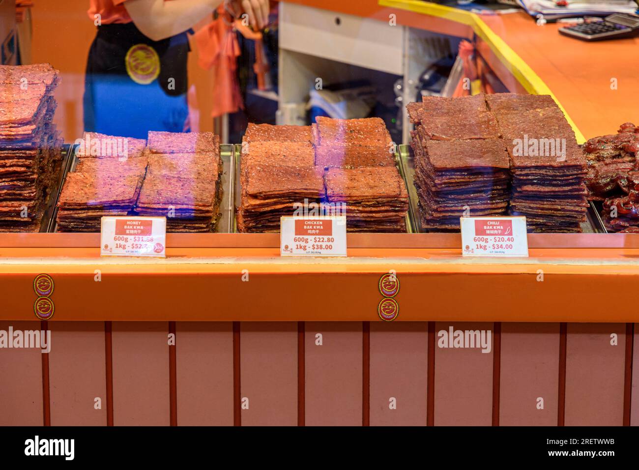 Looking through a window of a shop selling Bak Kwa in Chinatown ...