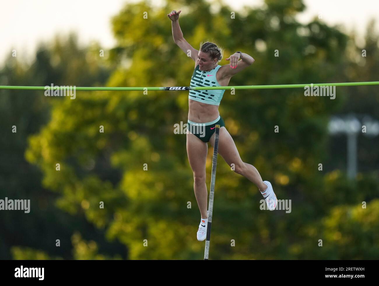 Alysha Newman clears the bar during the women's pole vault at the ...