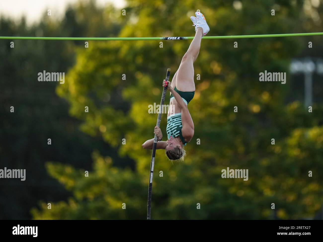 Alysha Newman, of London clears the bar during the women's pole vault ...