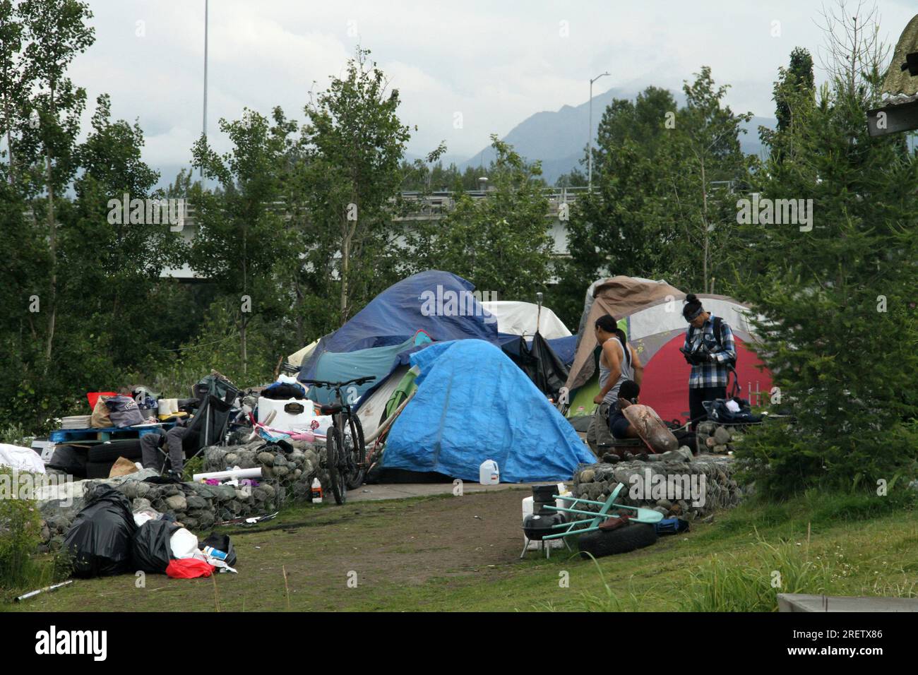 An outdoor tent city for the homeless is shown July 26, 2023, across ...