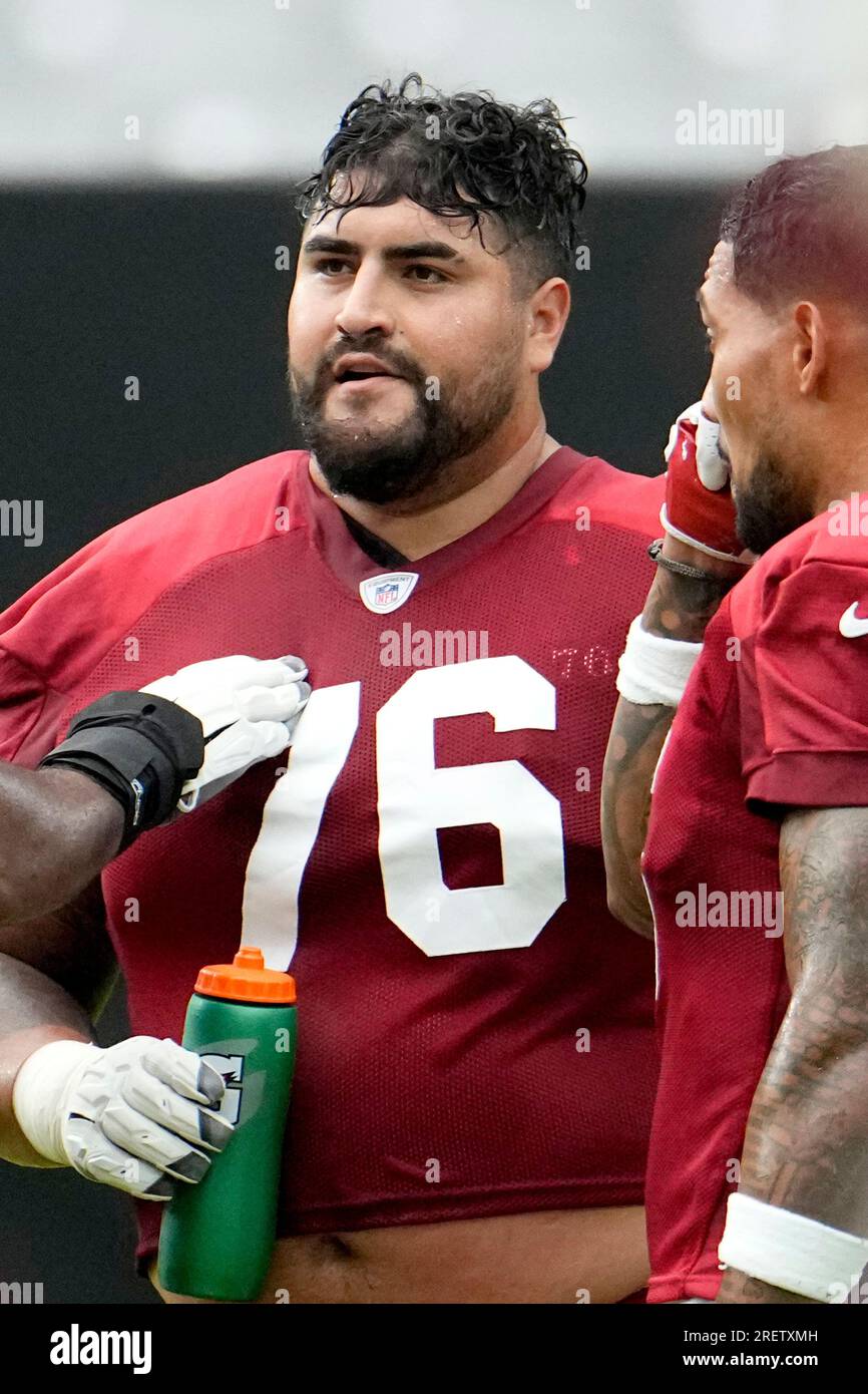 Arizona Cardinals guard Will Hernandez talks with teammates during NFL ...