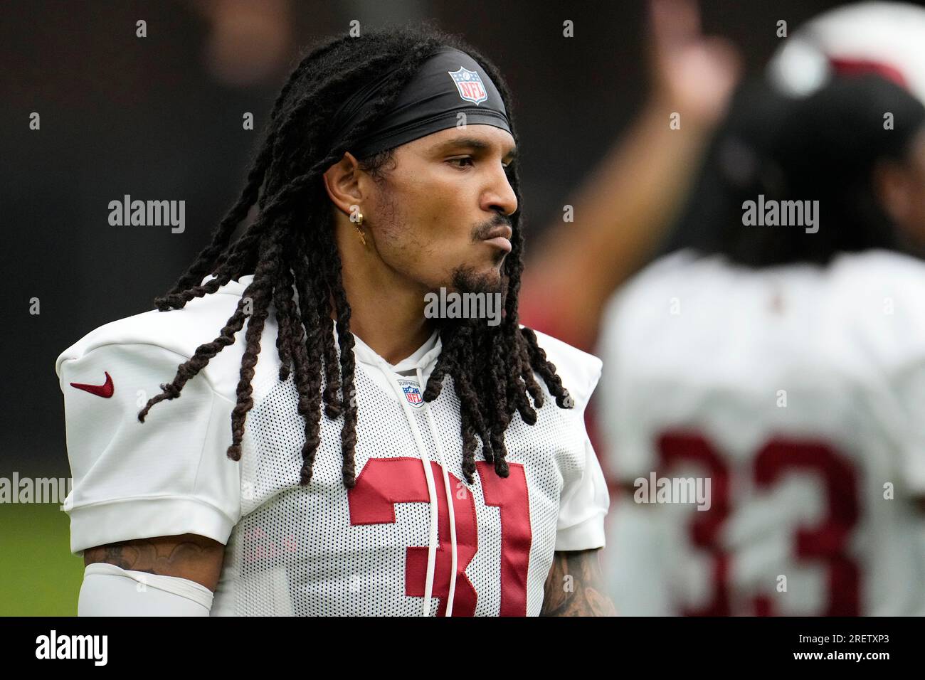 Arizona Cardinals safety Andre Chachere pauses on the field during NFL ...