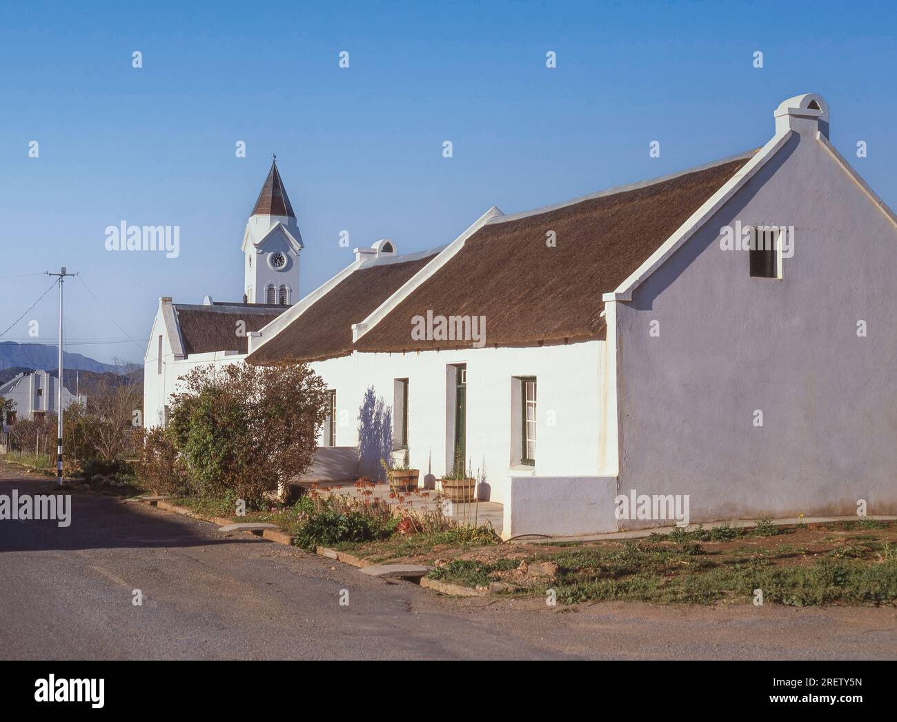 Cape Dutch cottages in McGregor, a small village in the mountains of ...