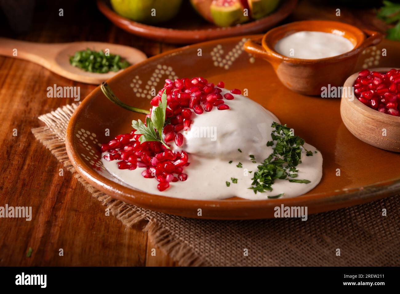 Chiles en Nogada, Typical dish from Mexico. Prepared with poblano chili ...