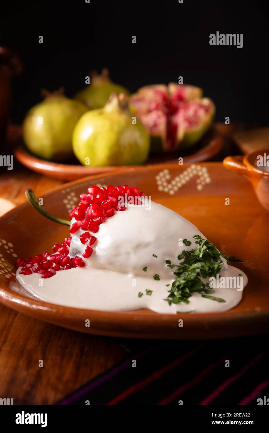 Chiles en Nogada, Typical dish from Mexico. Prepared with poblano chili ...