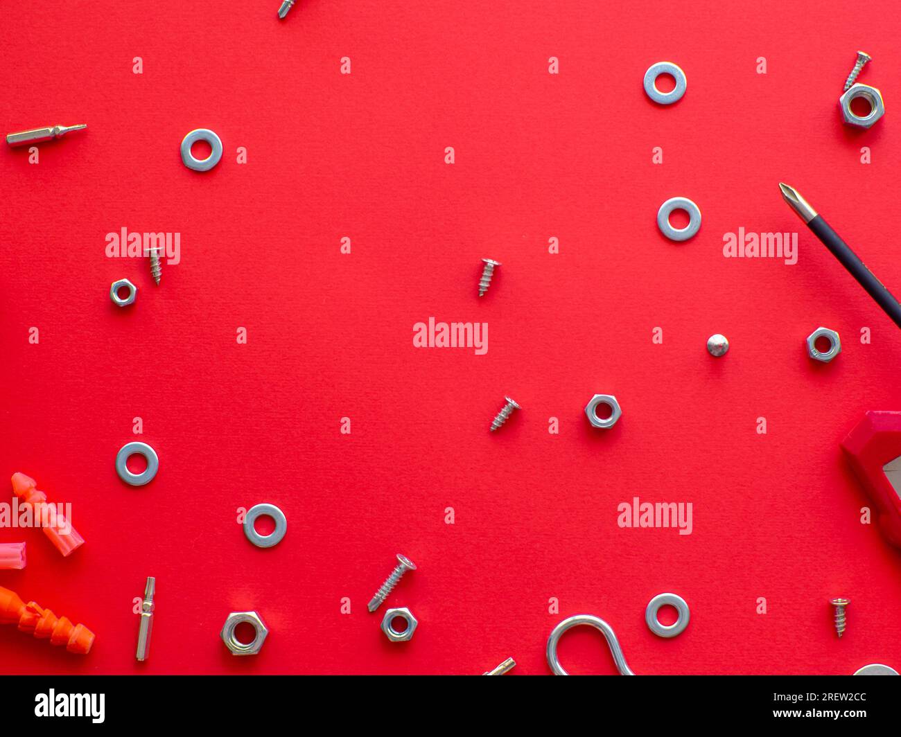 Construction tools red background with copy space Stock Photo - Alamy