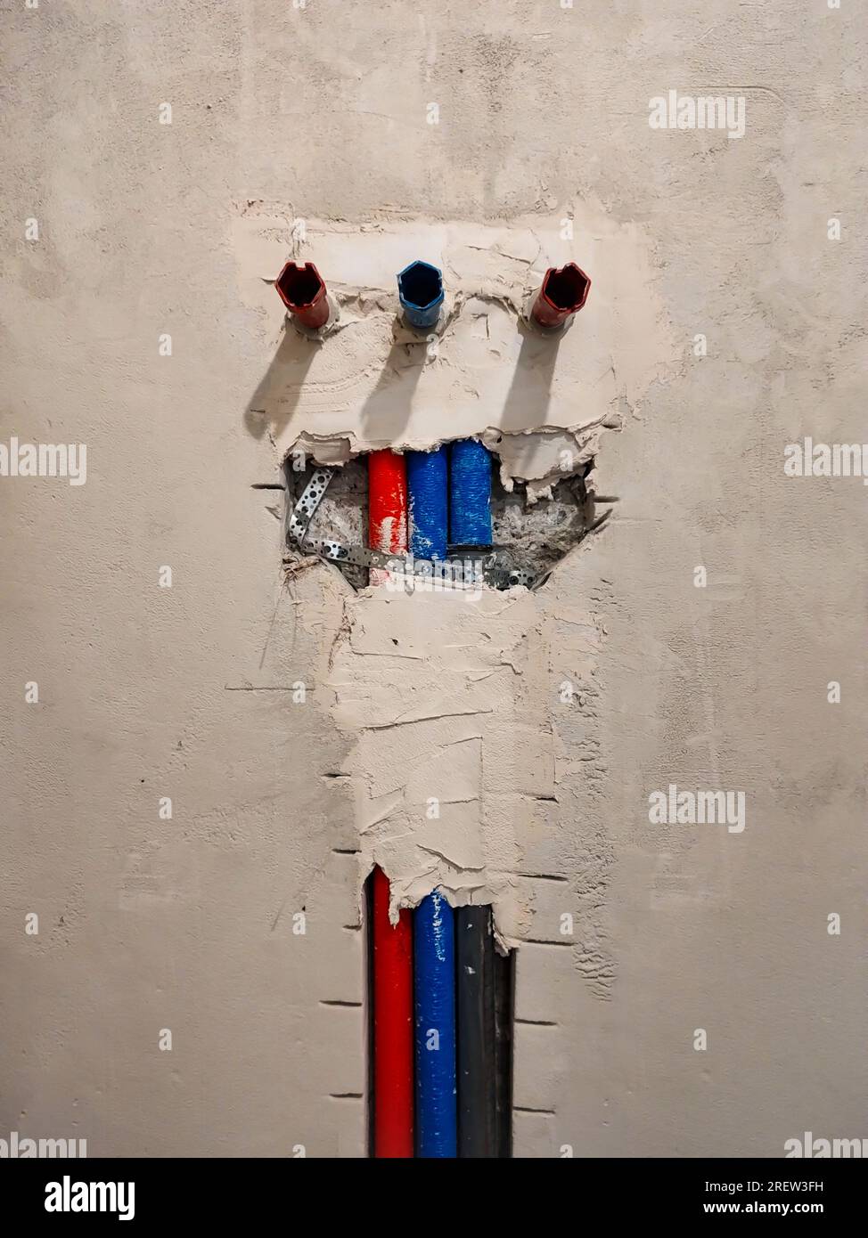 Wiring of plumbing pipes for water supply in a new house. Water main ...