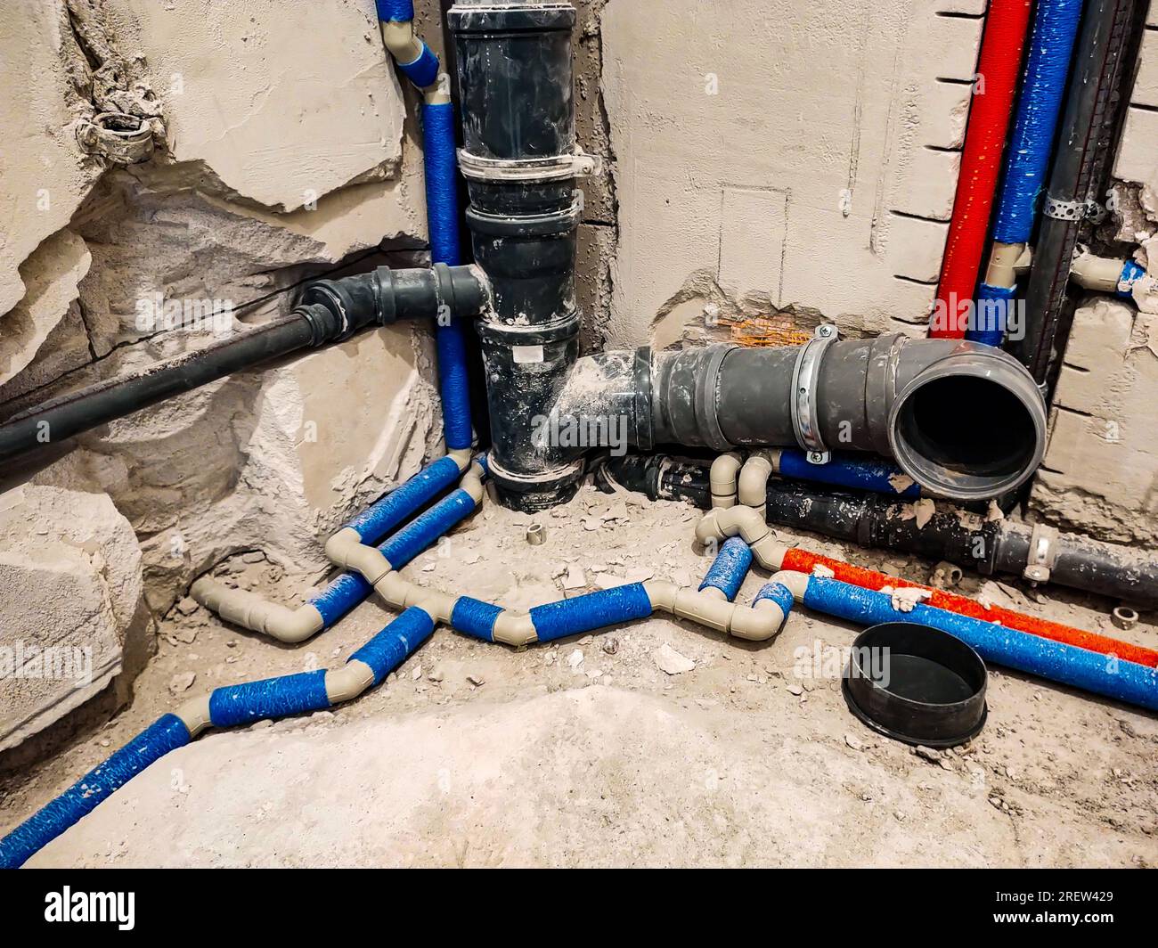 Wiring of plumbing pipes for water supply in a new house. Water main ...