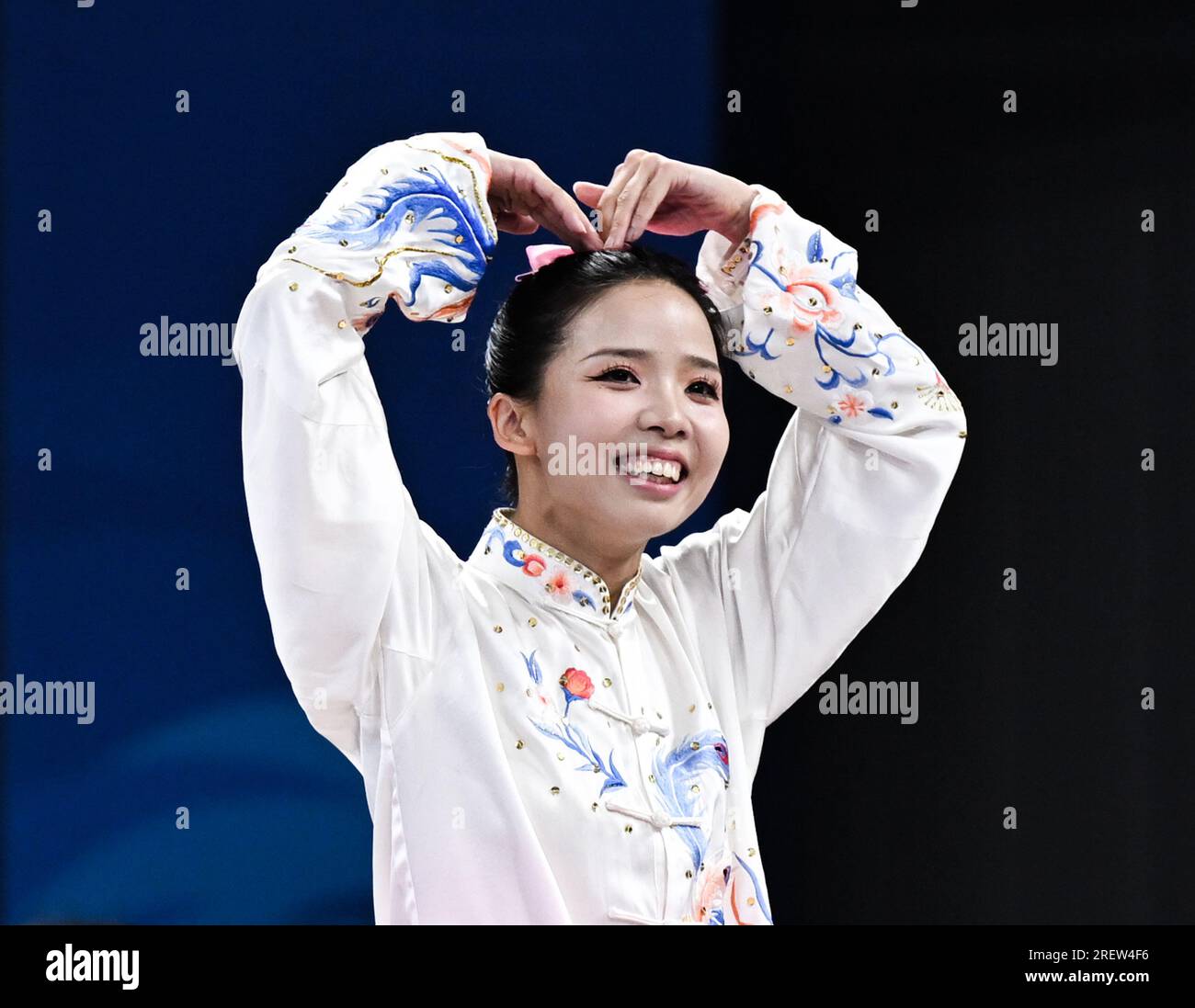 Chengdu, China's Sichuan Province. 30th July, 2023. Chen Xiaoli of China reacts after the Wushu ...