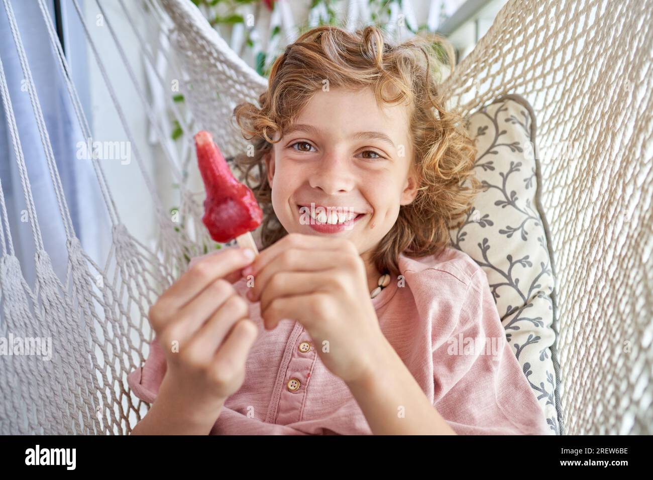 Boy eating ice cream cold treat smile hi-res stock photography and ...