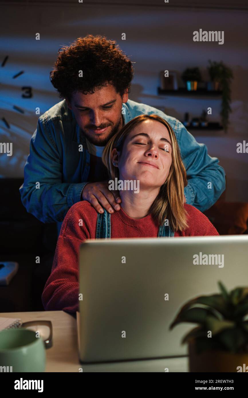 Vertical portrait of a woman tired and stressed from working with ...