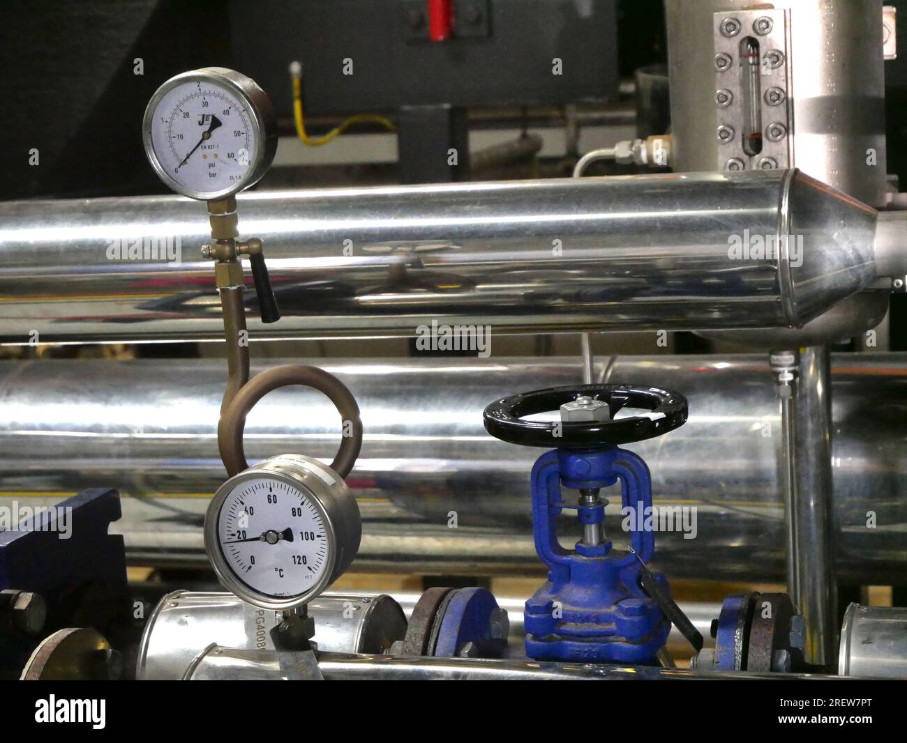 Industrial whiskey distiller construction, pipes and sensors, alcohol ...