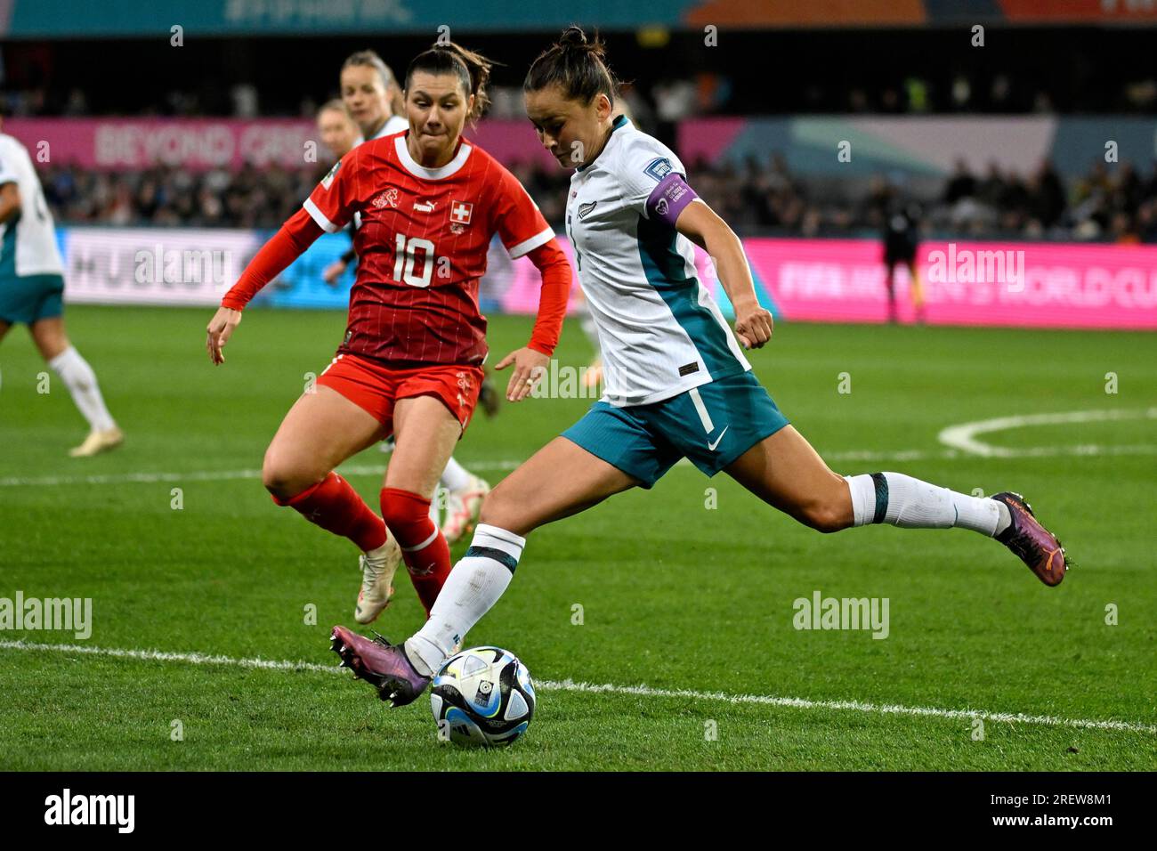 Switzerland's Ramona Bachmann, left, challenges New Zealand's Ali Riley ...