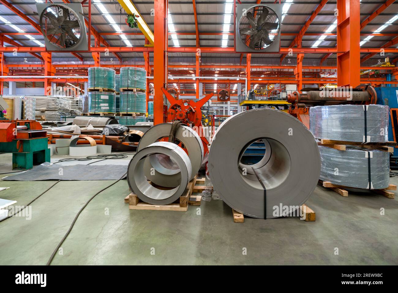 An industrial setting filled with neatly Steel sheet roll stack ...