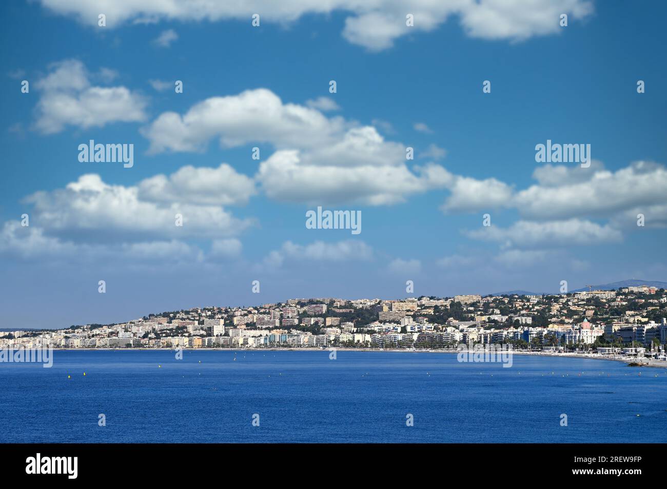 Beach and Nice town in summertime landscape Stock Photo - Alamy