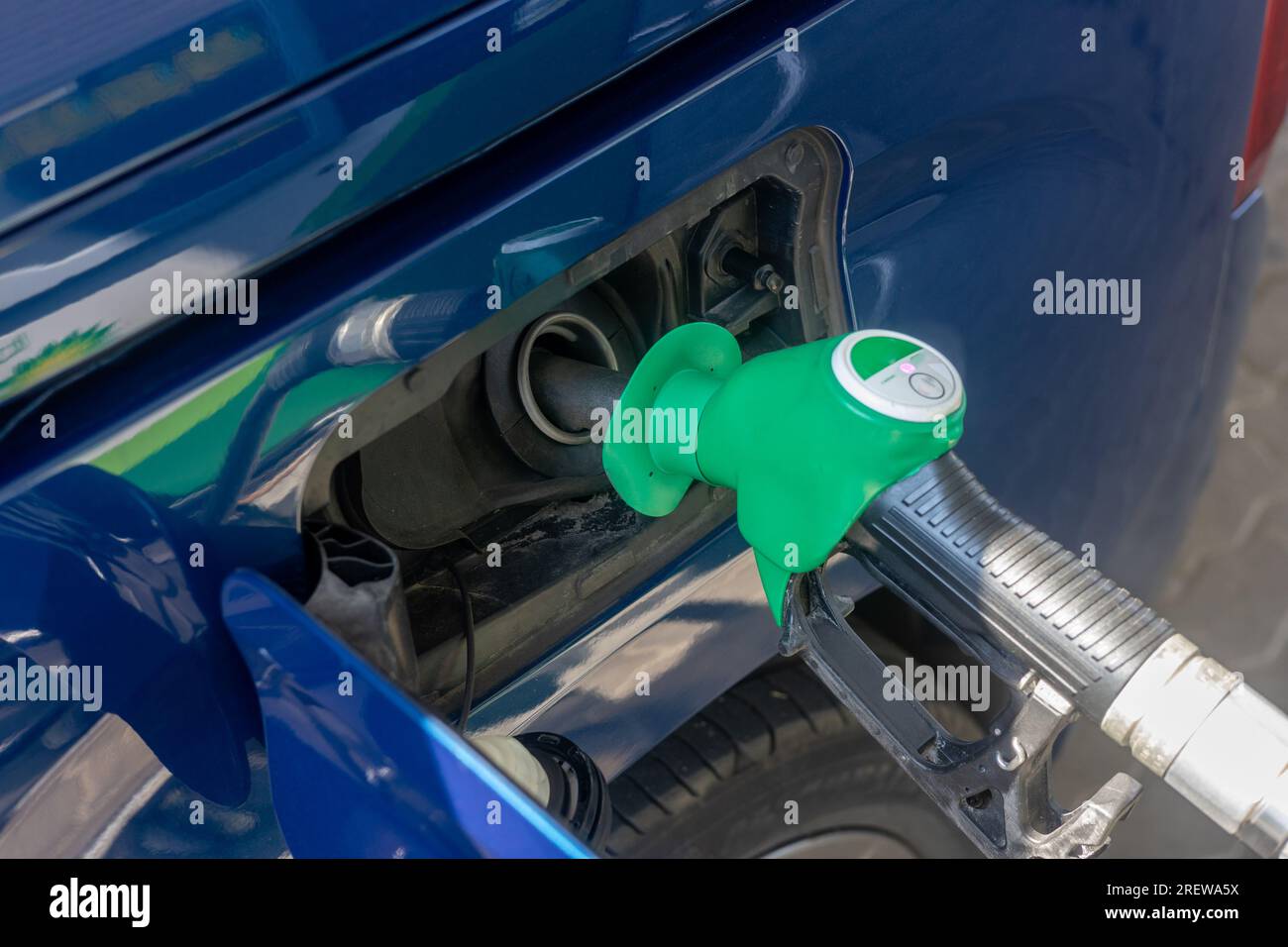 refueling a car at a gas station Stock Photo - Alamy