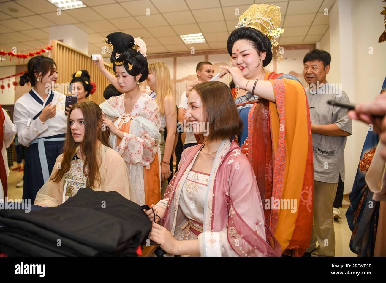 Urumqi, China's Xinjiang Uygur Autonomous Region. 23rd July, 2023. A local girl dressed in ...