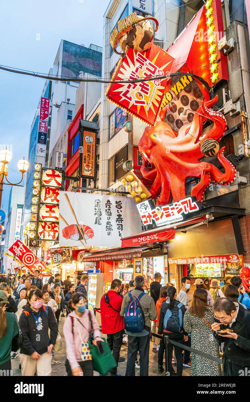 People outside the Konamon Museum restaurant in Dotonbori in the ...