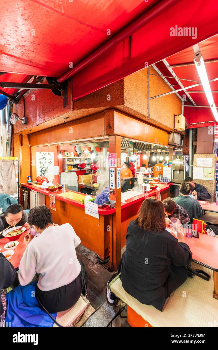 The very popular Kinryu Ramen restaurant in Dotonbori, Osaka. Diners ...