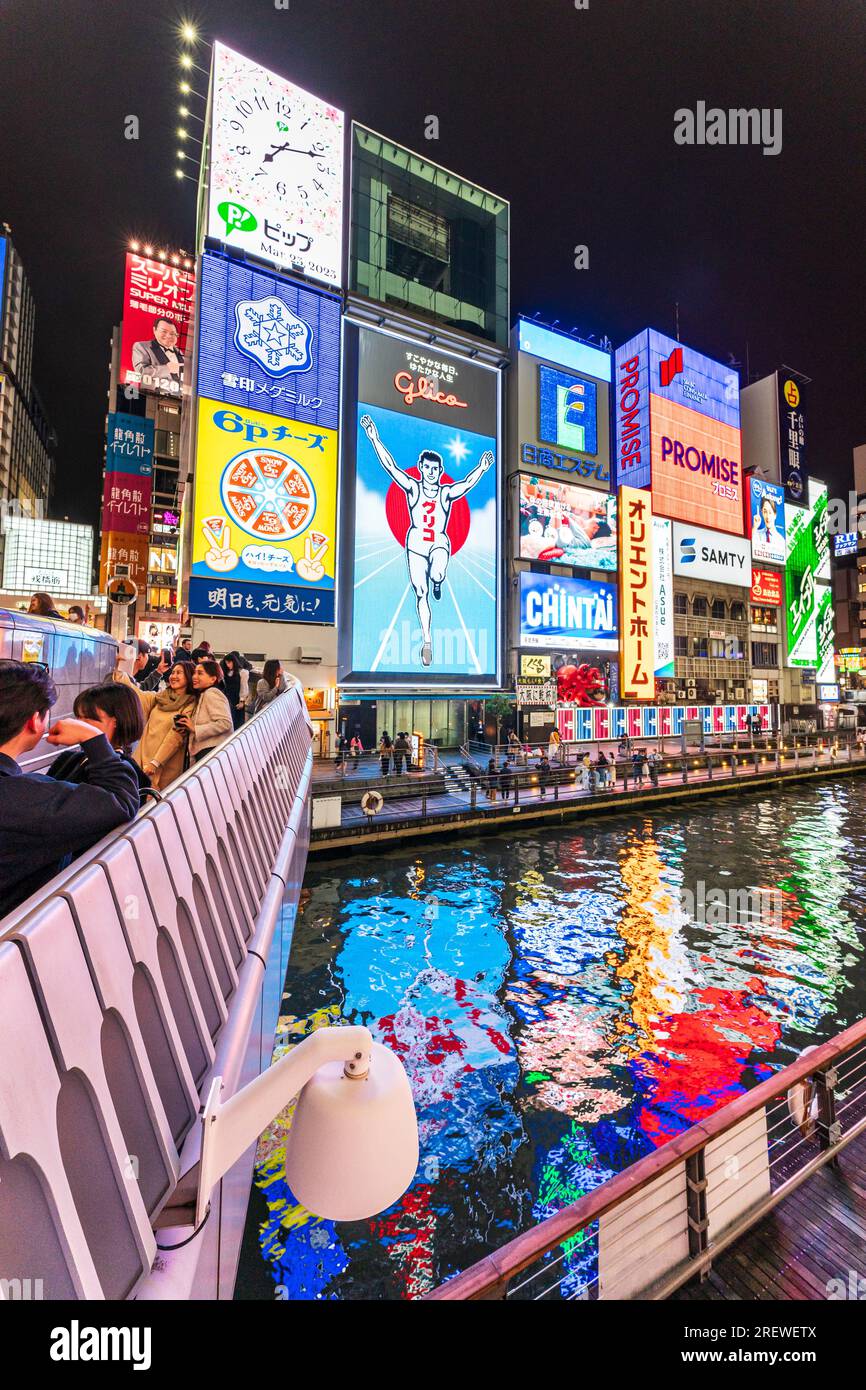 View from the Ebisu bridge at night of the famous Glico Running Man ...