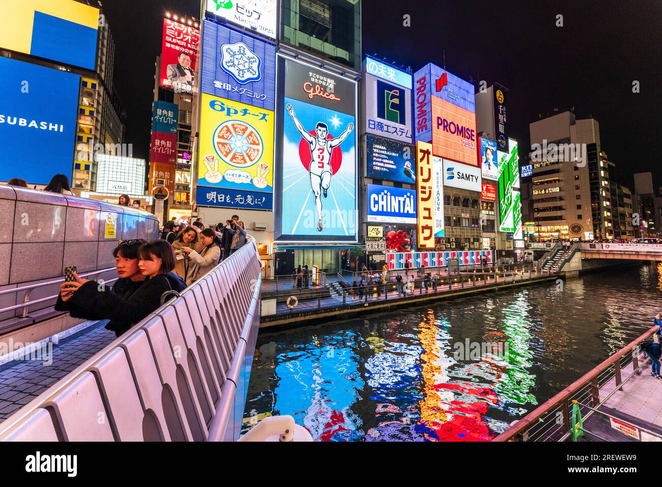 View from the Ebisu bridge at night of the famous Glico Running Man ...