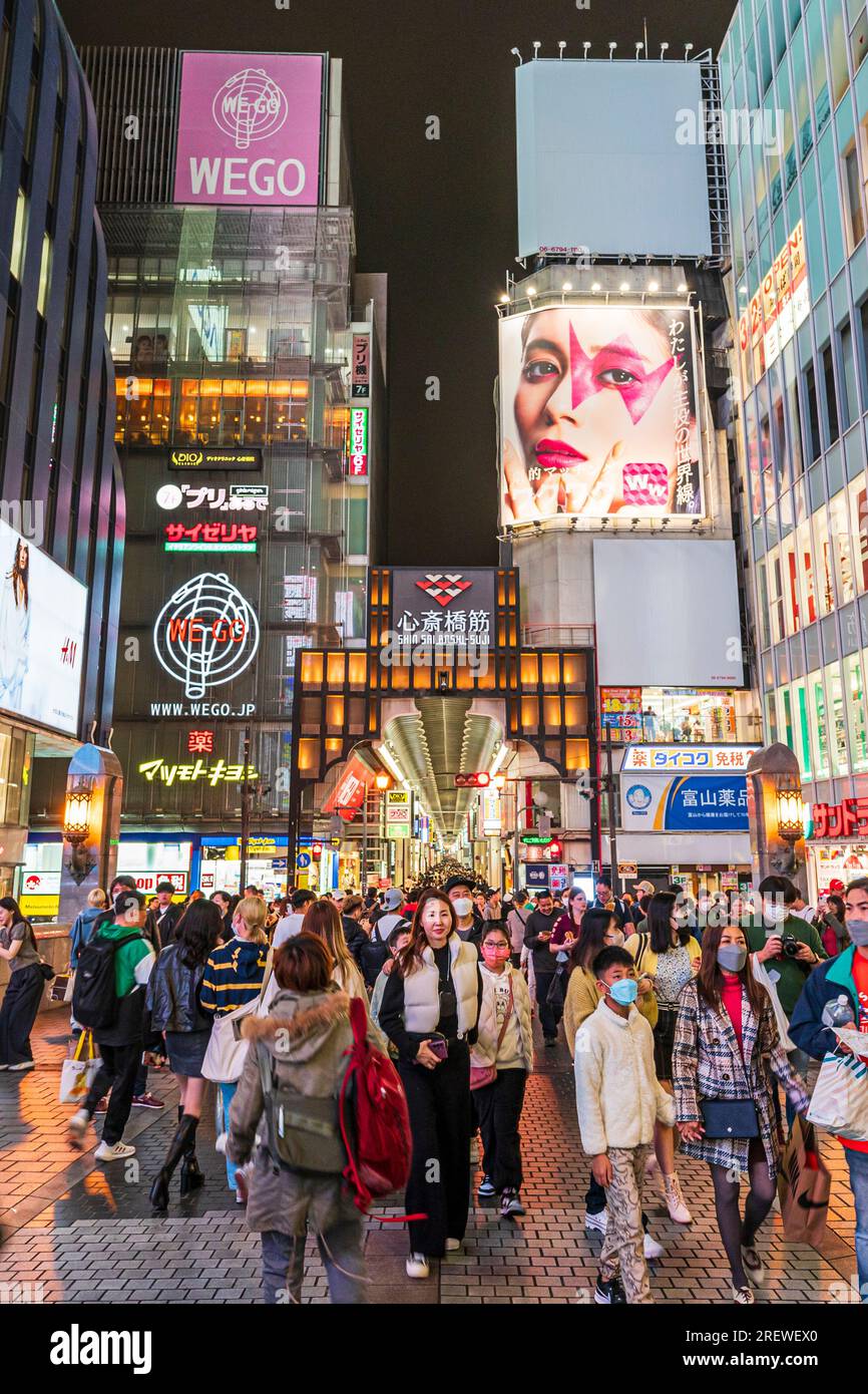 Night time view from the Ebisu bridge at Dotonbori, Osaka, of the entrance to the very long ...