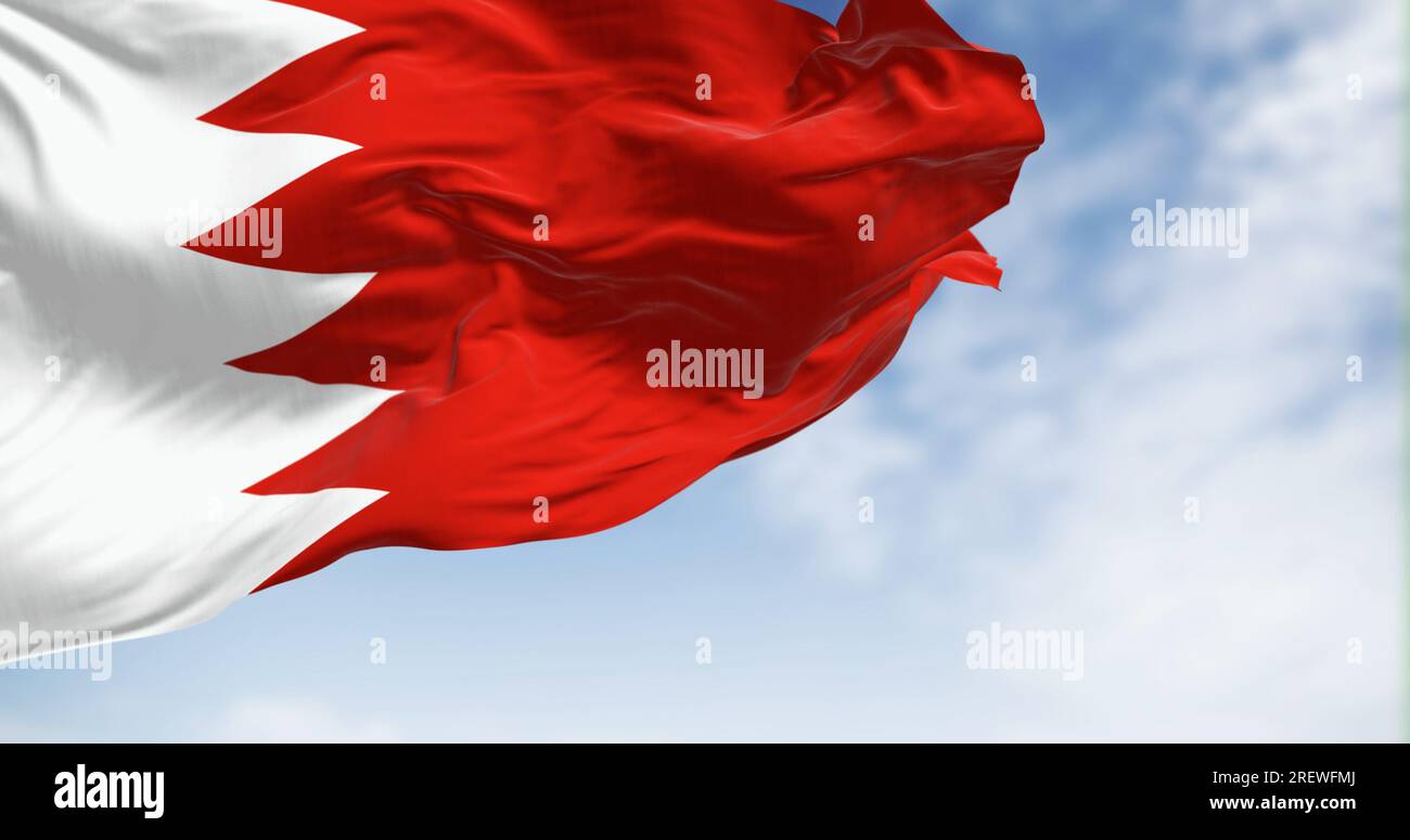 National flag of Bahrain waving in a clear day. White band on the left ...