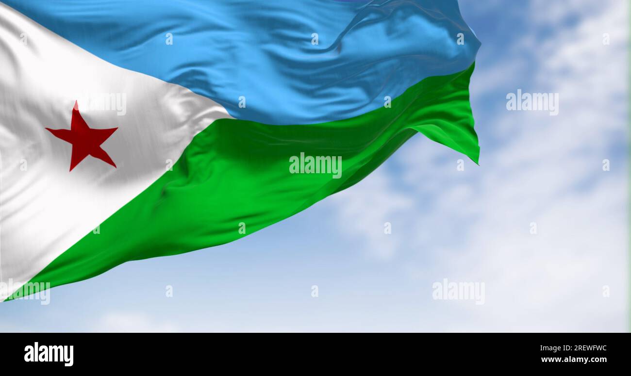National flag of Djibouti waving on a clear day. Horizontal bicolor ...