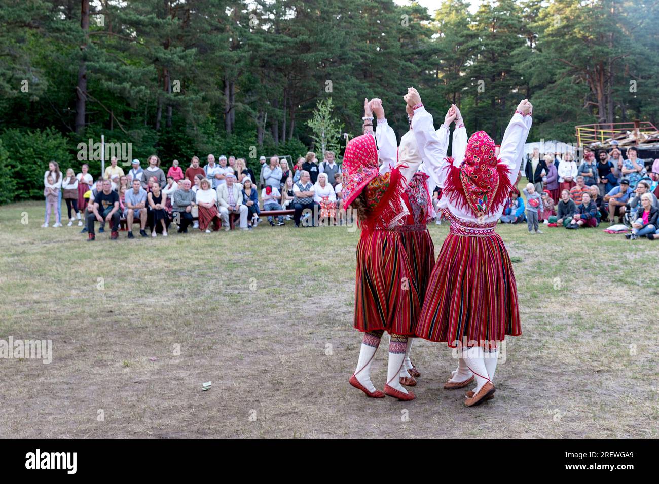 Women in traditional estonian clothing dancing and celebrating estonian ...