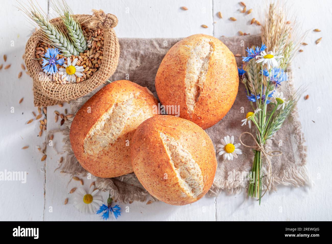 Fresh buns freshly baked in the bakery. Freshly baked rolls in the ...