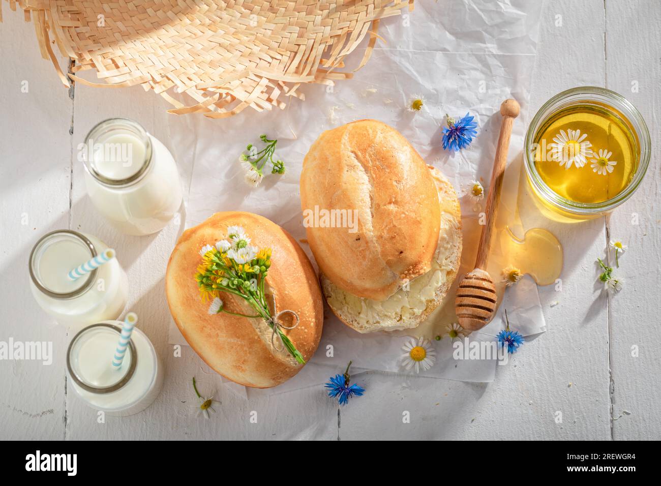 Sweet and healthy wheat buns for breakfast. Breakfast with milk and ...