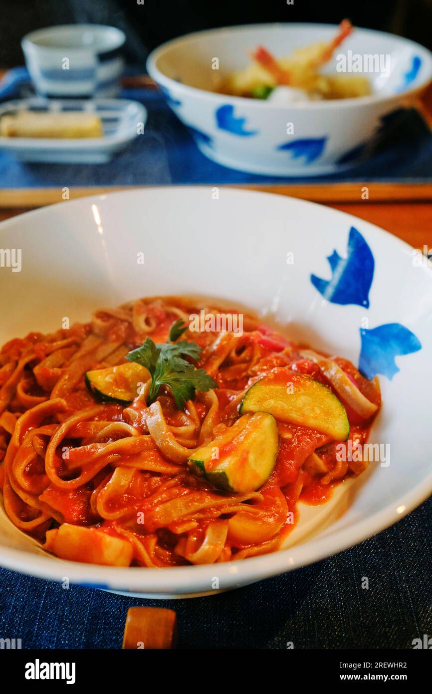June 2023, Spaghetti made from Japanese buckwheat noodle with tomato ...