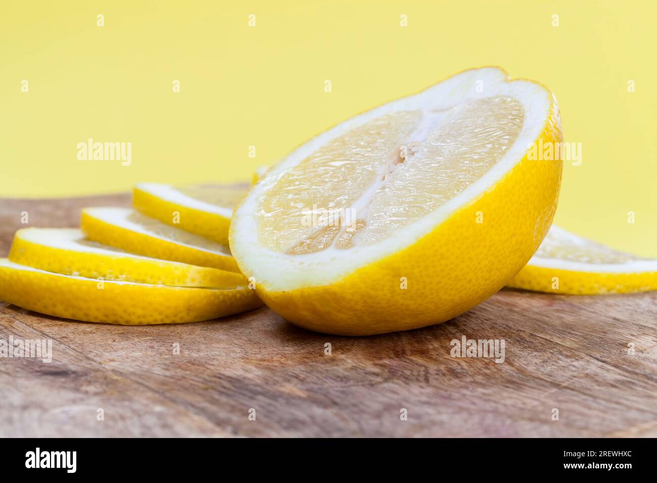 cut into pieces juicy and delicious sour yellow lemon, yellow citrus ...