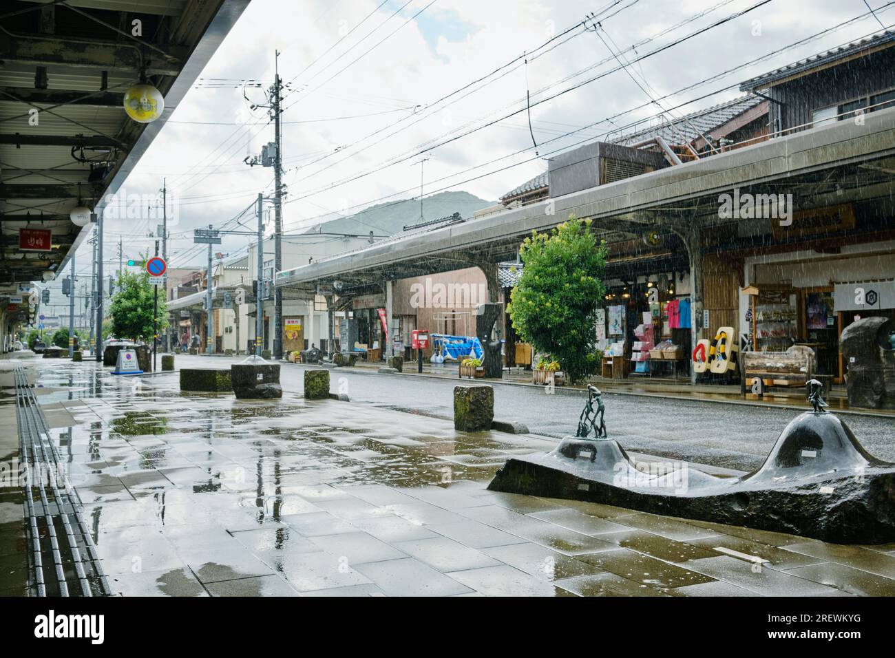 June 2023, Sakaiminato. Mizuki Shigeru Road on a rainy day Stock Photo ...