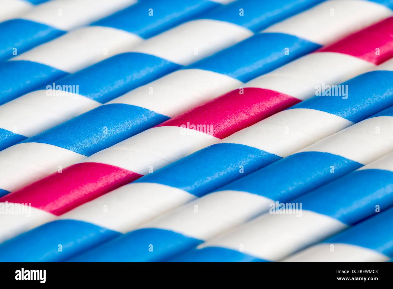 multi colored tubes made of paper and pulp for cold drinks, close up of ...