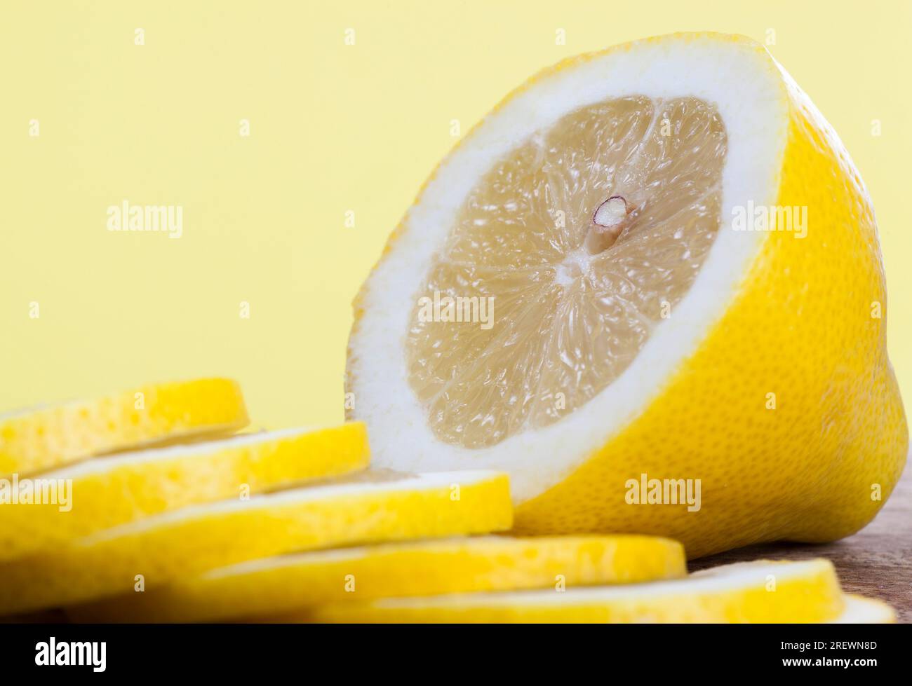 cut into pieces juicy and delicious sour yellow lemon, yellow citrus ...