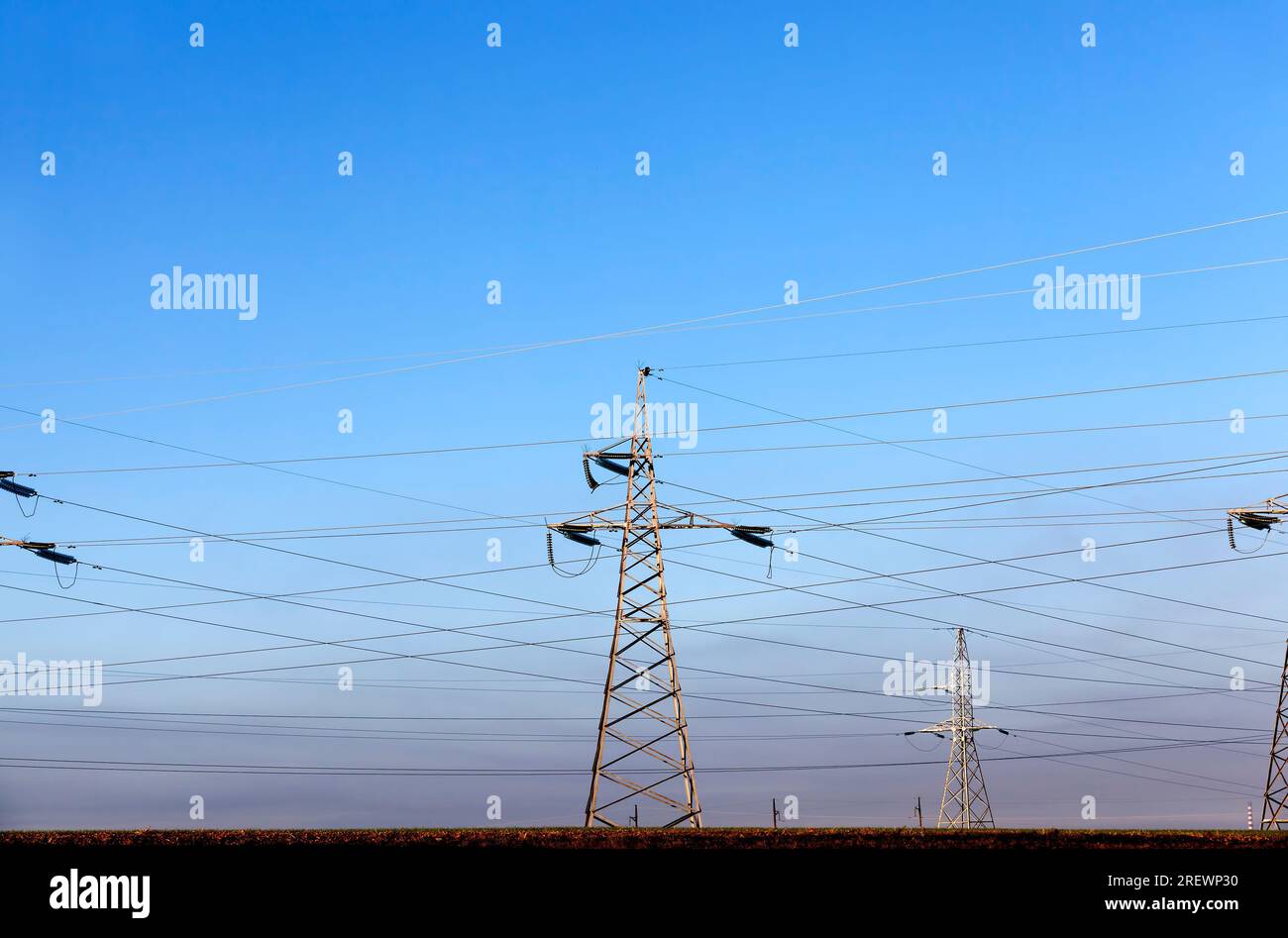 high voltage poles with electric wires, designed poles and metal wires ...