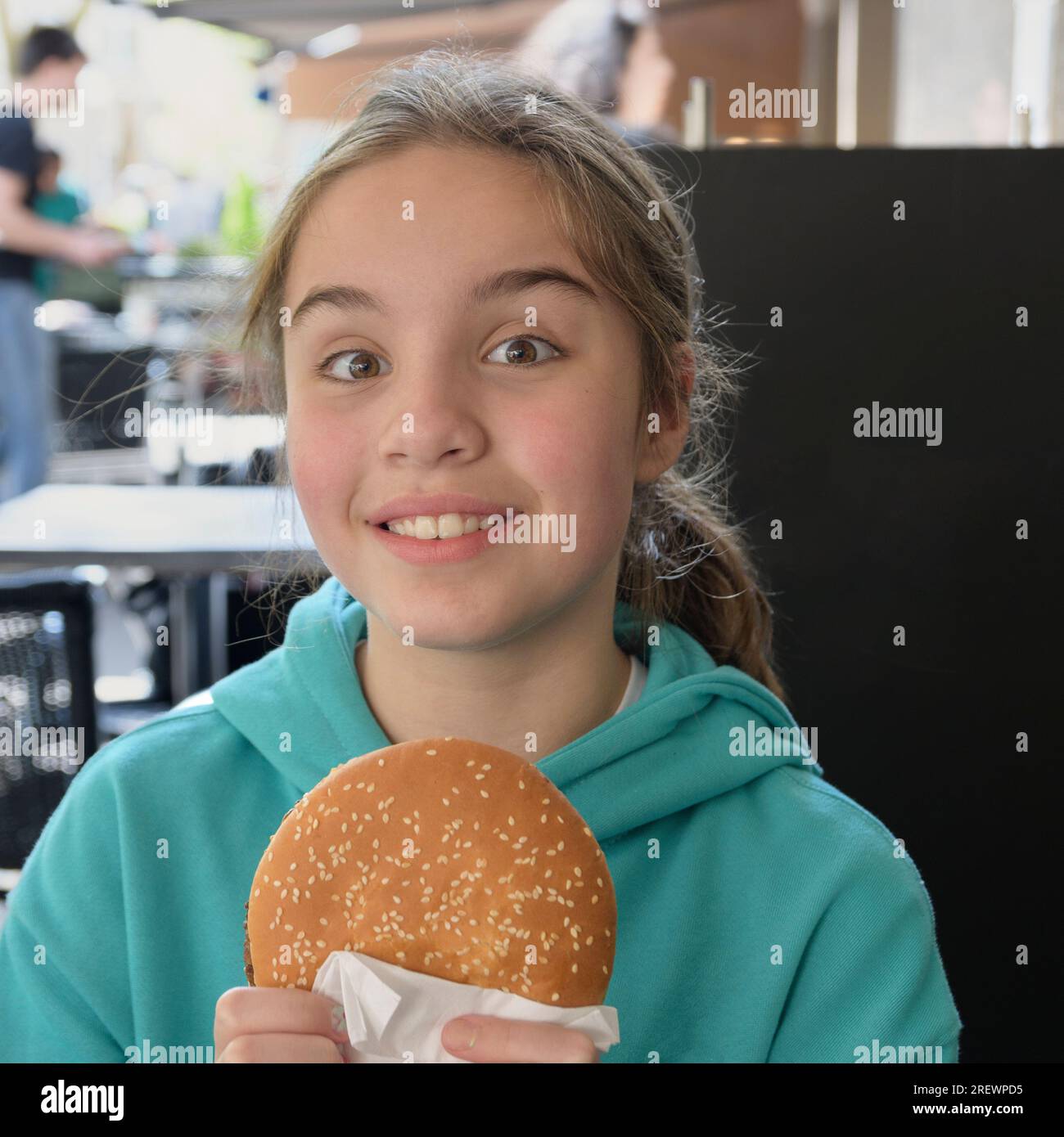 Teen girl eating school hi-res stock photography and images - Alamy