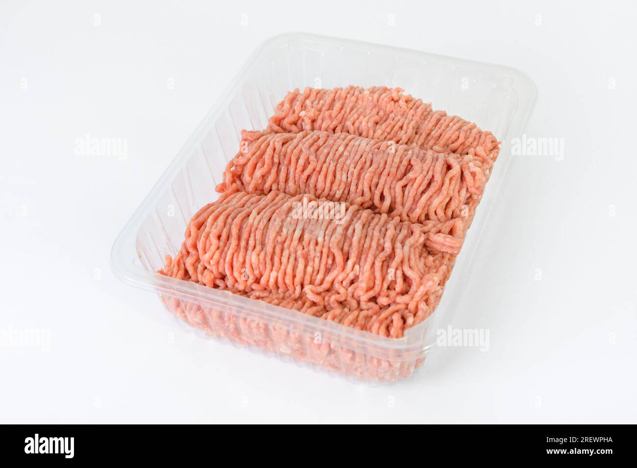 Close up of a minced pork in store-bought plastic transparent packaging ...