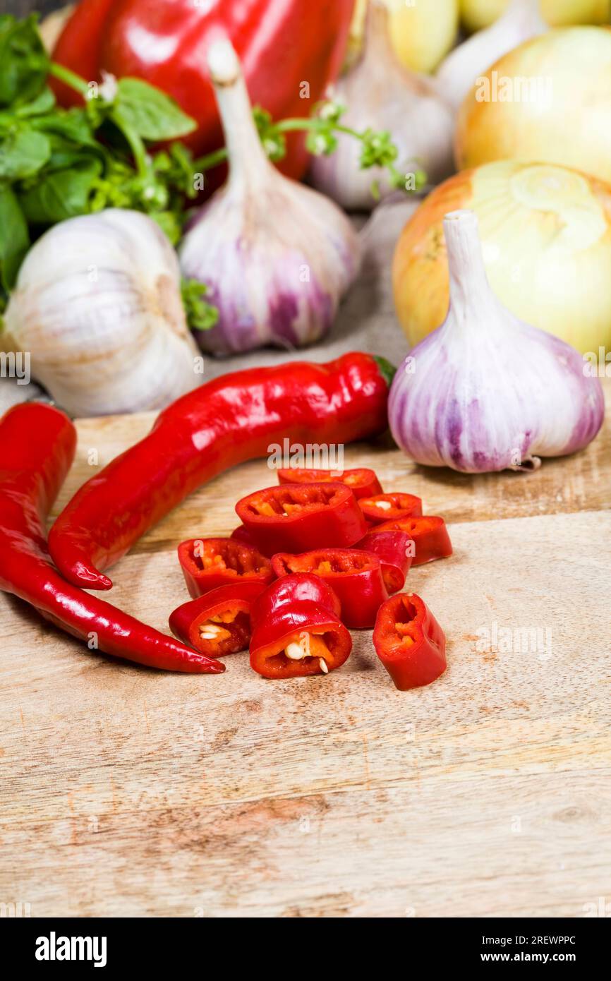 hot red pepper and other vegetables on the kitchen table while cooking ...