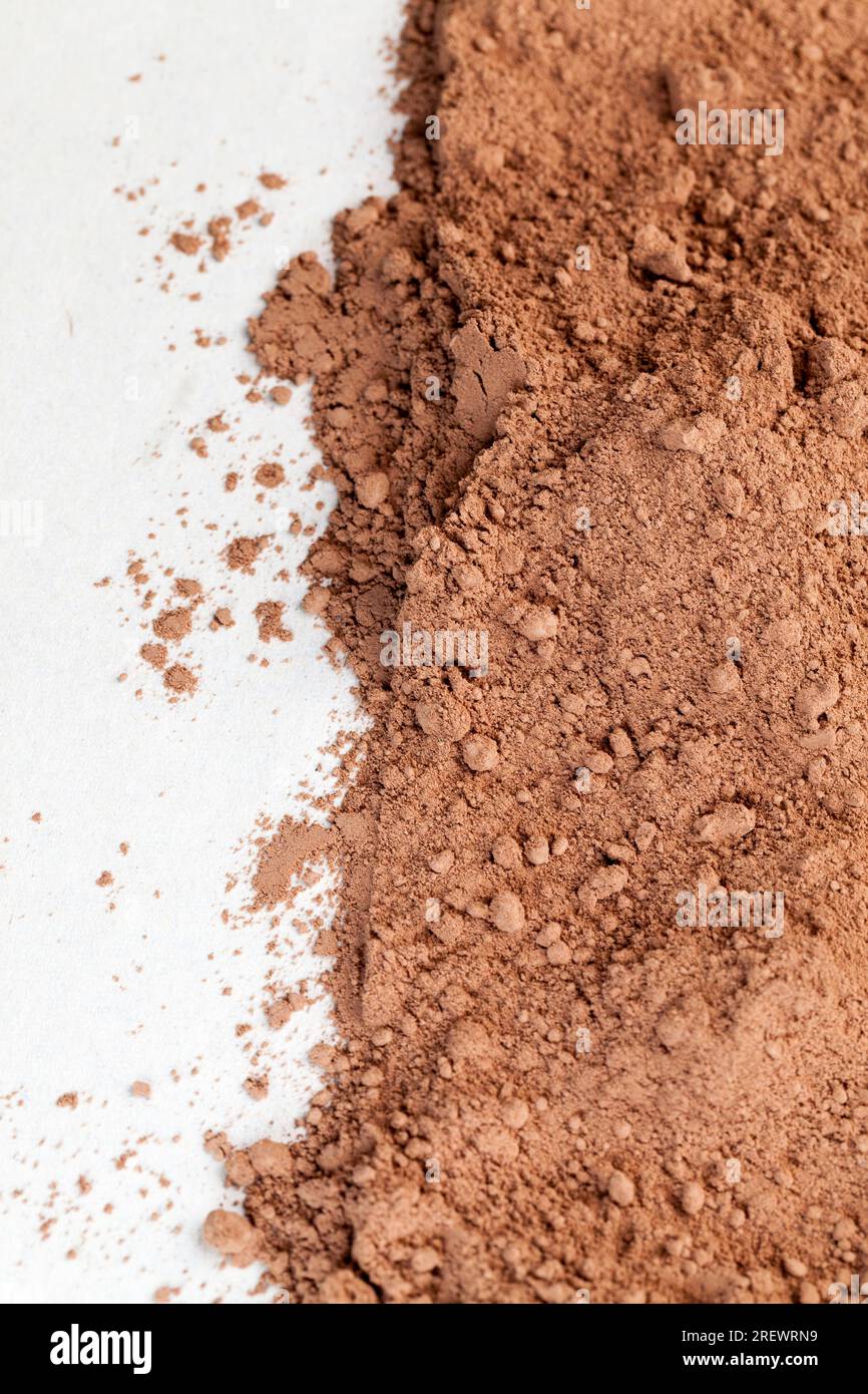 a large pile made from cocoa bean powder for making chocolate or other ...