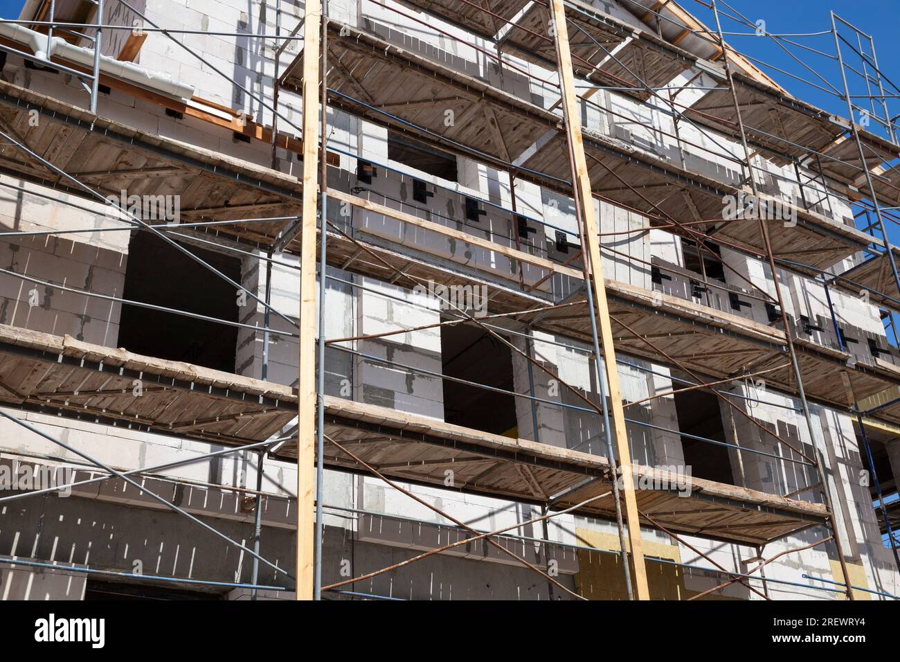 building a new home on the building scaffolding for construction and ...