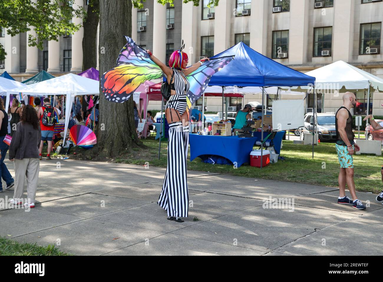 A woman on stilts performs at the 2023 Pride Festival of Central PA ...
