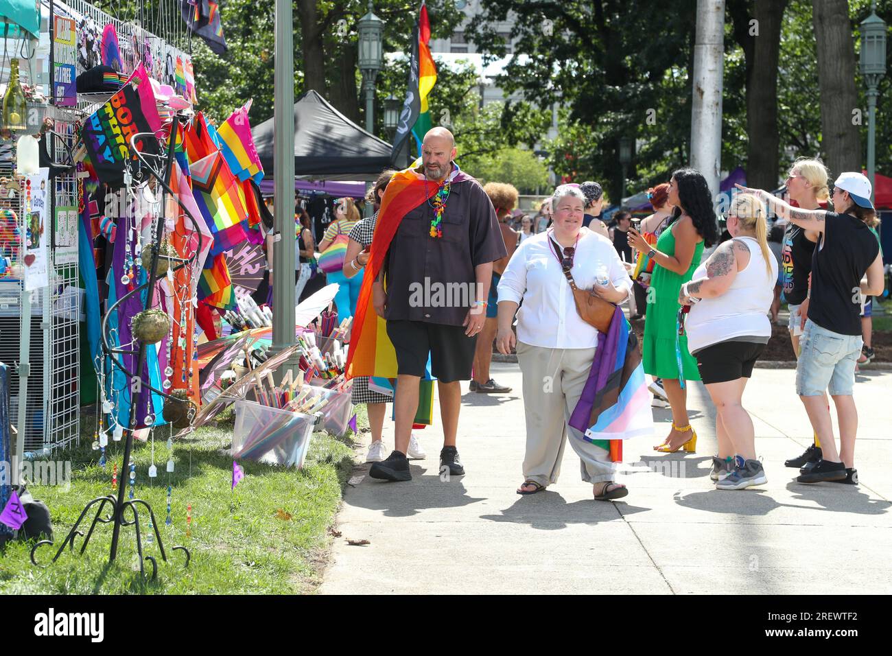 United States Senator John Fetterman (L) walks though the 2023 Pride ...