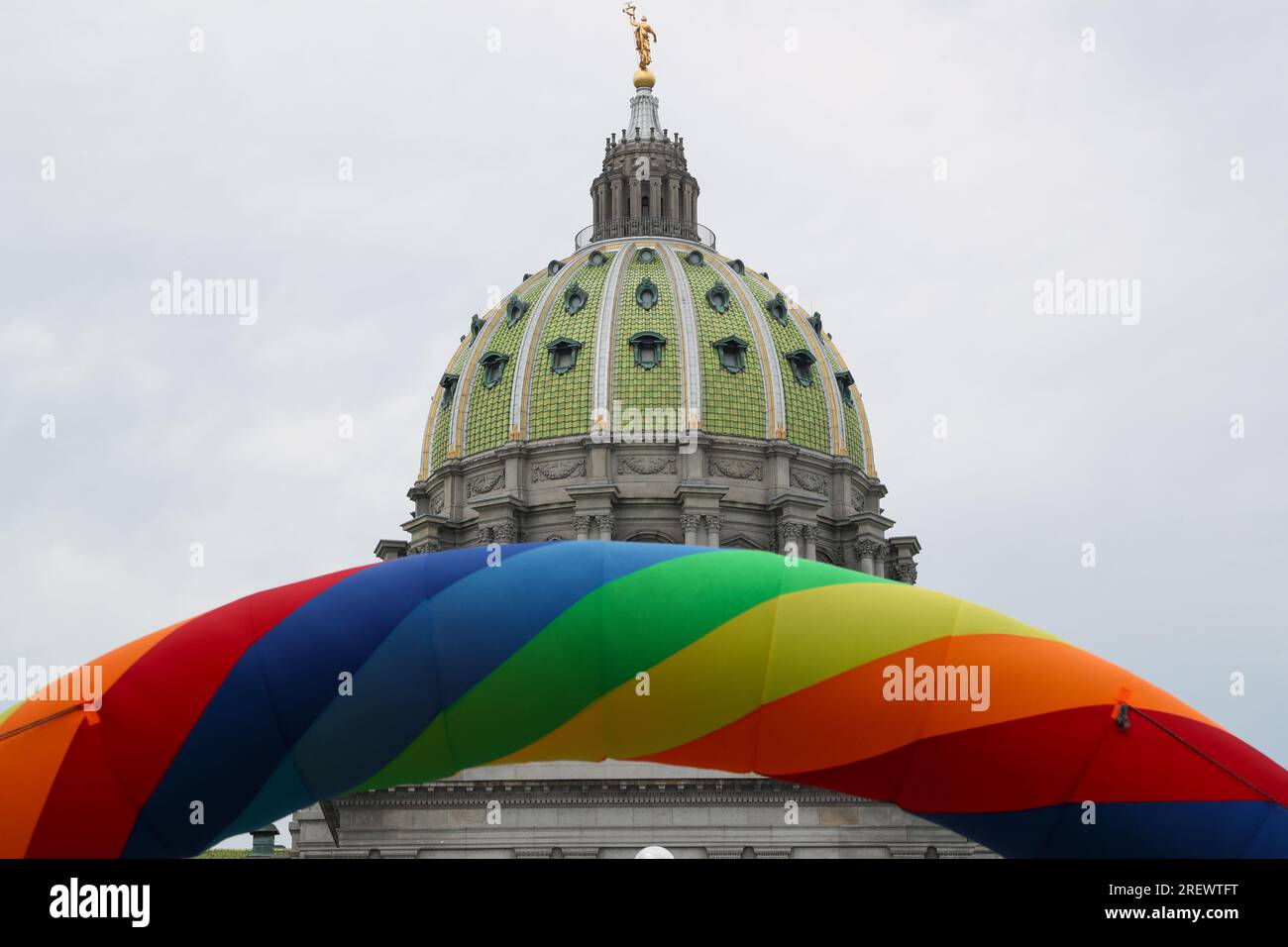 An inflatable rainbow arch is seen outside of the Pennsylvania State ...