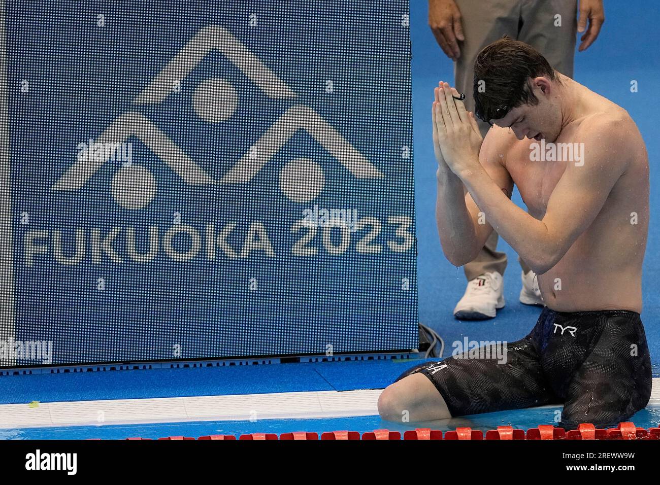Hunter Armstrong, of the United States, celebrates after winning the ...