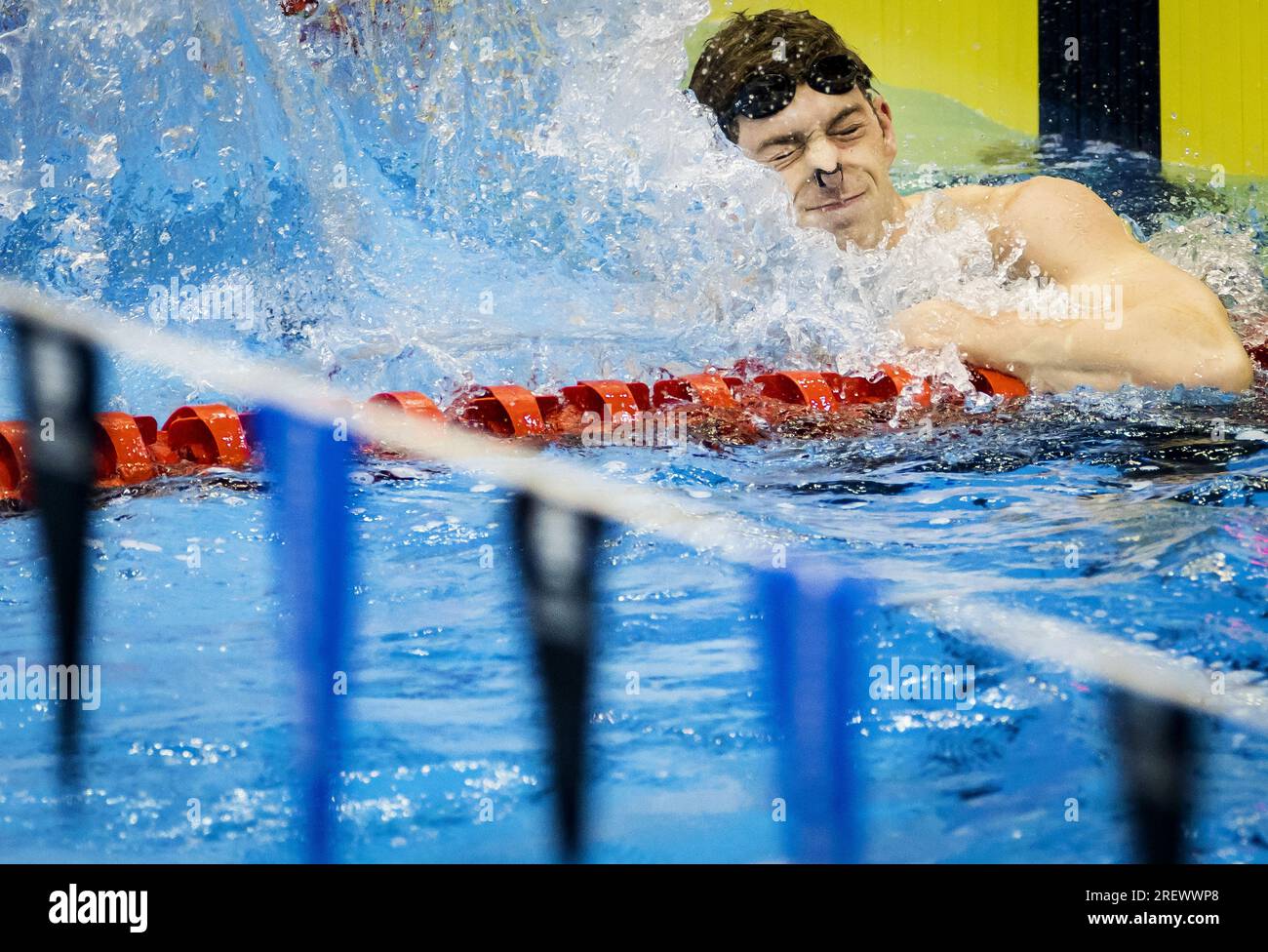 FUKUOKA - Hunter Armstrong from America wins the men's 50 back on the ...