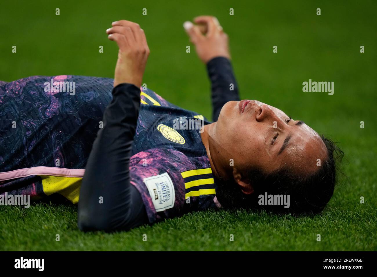 Injured Colombia's Mayra Ramirez lays on the ground during the Women's ...