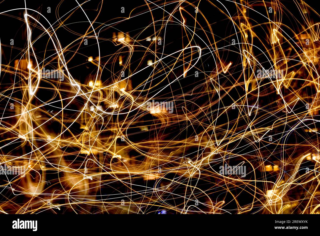 blurred multi colored surface from the rapid movement of glowing ...