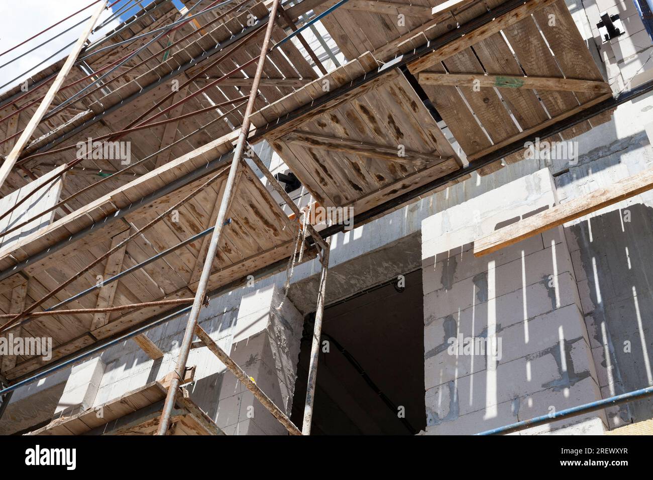 building a new home on the building scaffolding for construction and ...